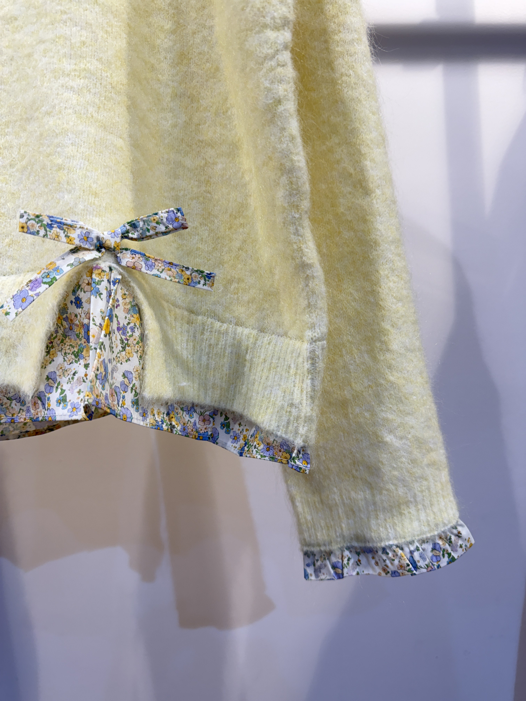 PULL COULEUR PASTEL BAS DE CHEMISE NOUEE | Paris Fashion Shops