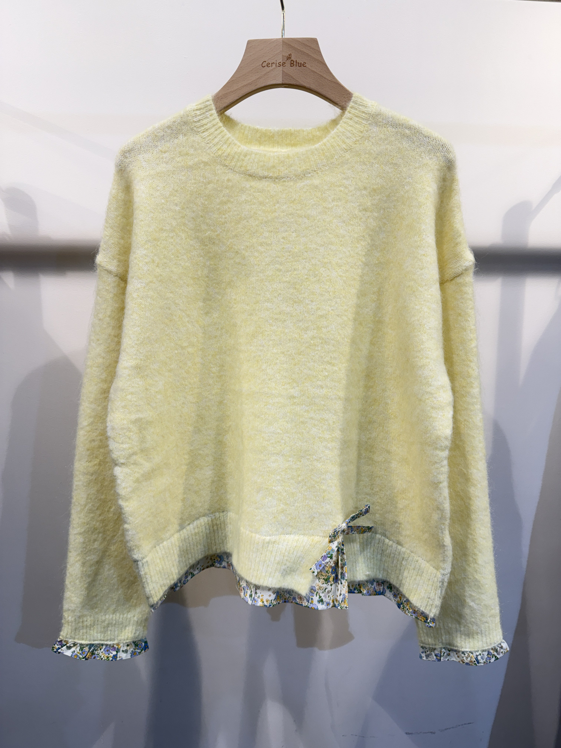 PULL COULEUR PASTEL BAS DE CHEMISE NOUEE | Paris Fashion Shops