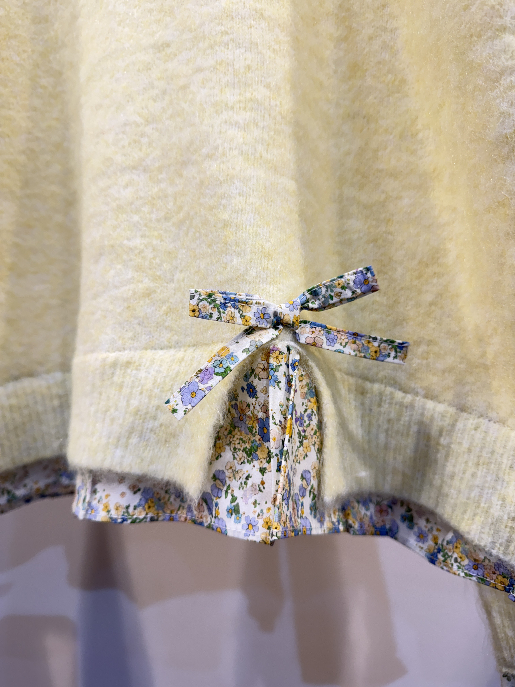 PULL COULEUR PASTEL BAS DE CHEMISE NOUEE | Paris Fashion Shops