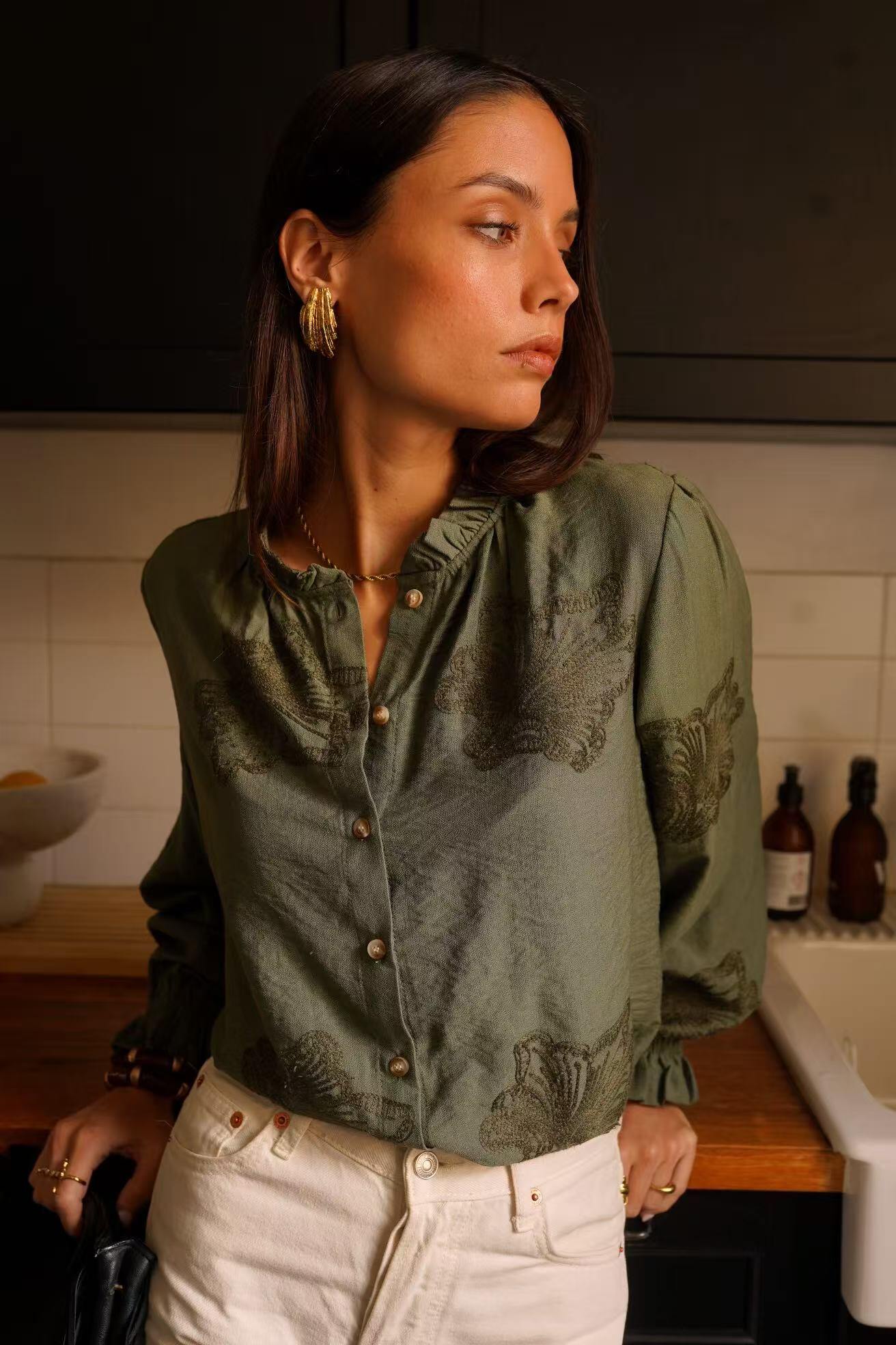 Embroidered khaki blouse, a subtly sophisticated piece that combines ...
